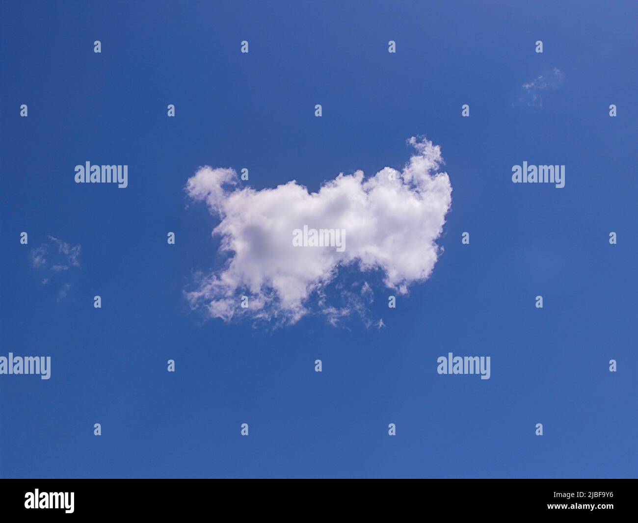 Single cloud in the sky, cloud shape photo. White summer cloud Stock ...