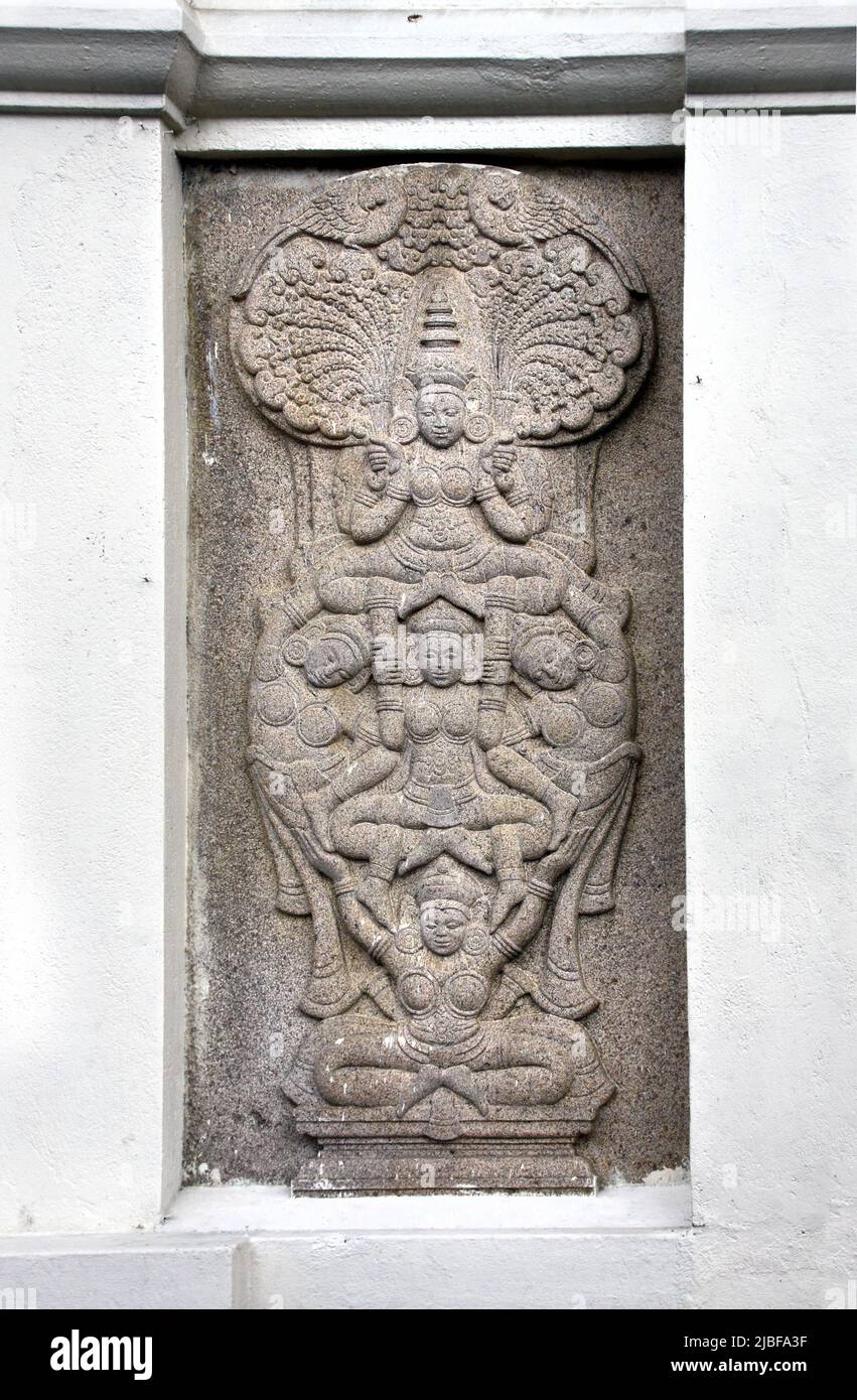 Stone bas-relief with women's dancers on wall of Sri Dalada Maligawa ...