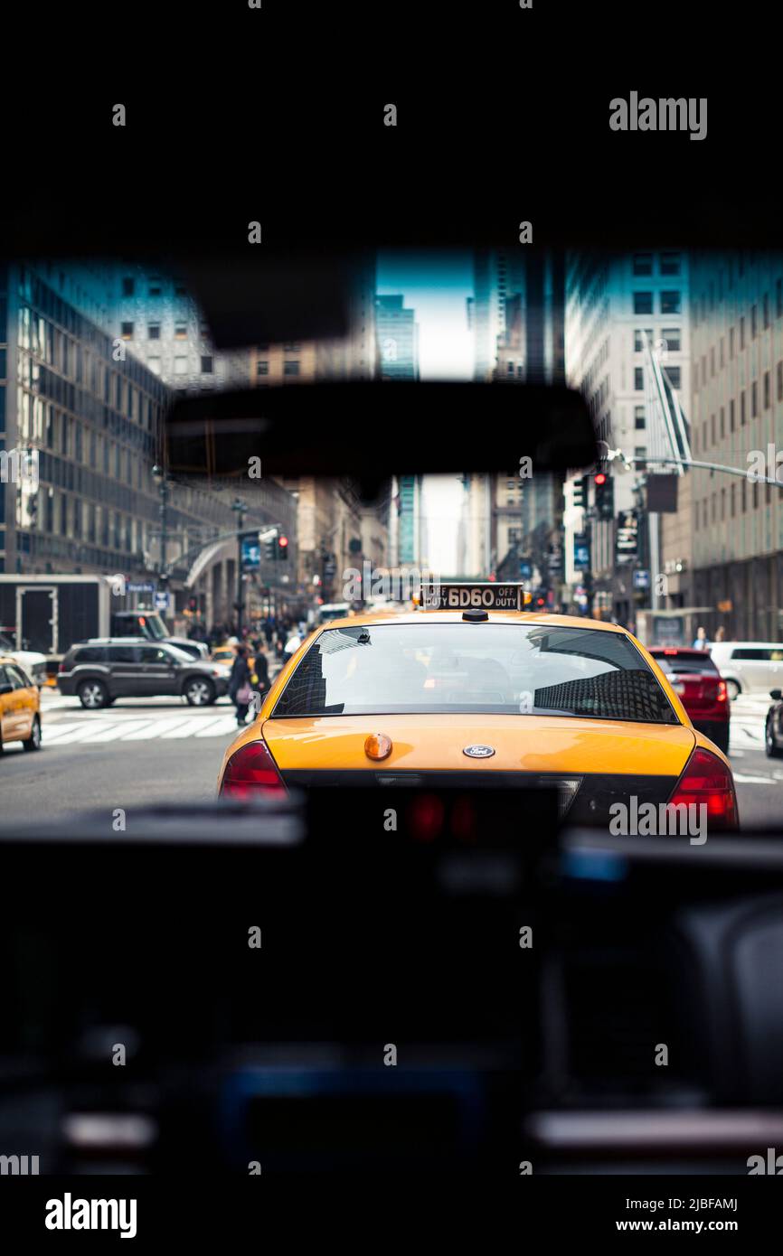 Taxi driving on street in New York, USA Stock Photo - Alamy
