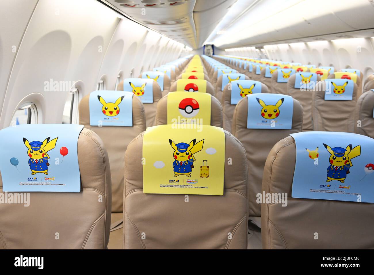 The cabin of Skymark's 2nd "Pikachu Jet BC" (Boeing 737-800, JA73NG ...