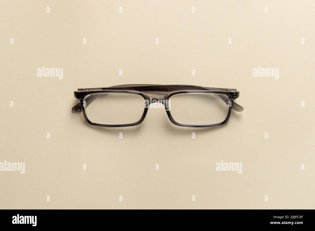 Prescription glasses on table hi-res stock photography and images - Alamy