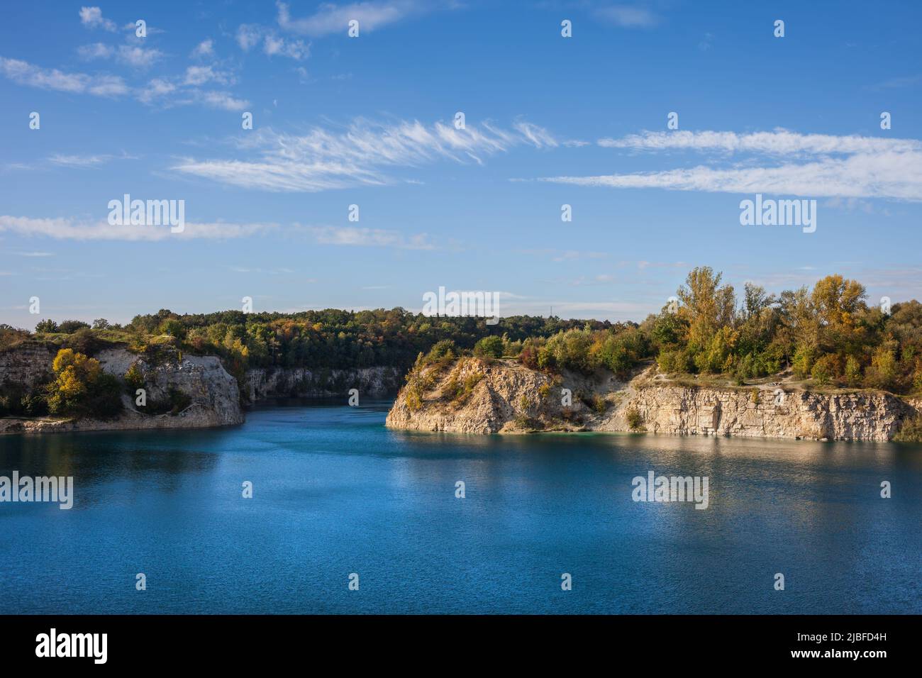 Lake and cliffs in Zakrzowek reservoir, old limestone quarry landscape ...
