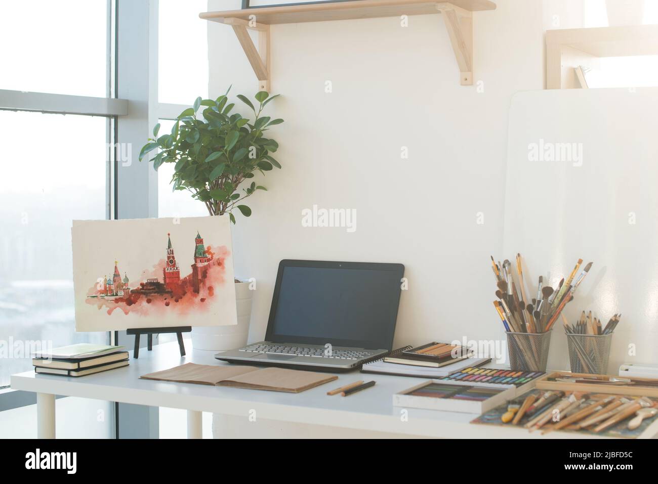 Painter workplace in order side view. Designer desk with drawing ...