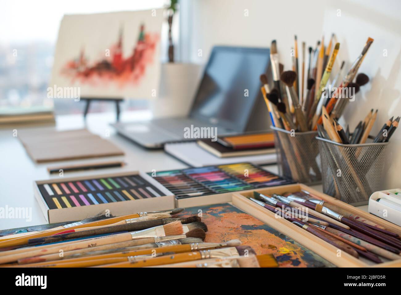 Painter workplace in order side view. Designer desk with drawing ...