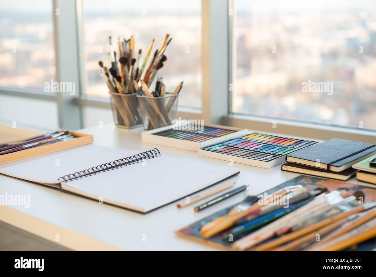 Painter workplace in order side view. Designer desk with drawing ...