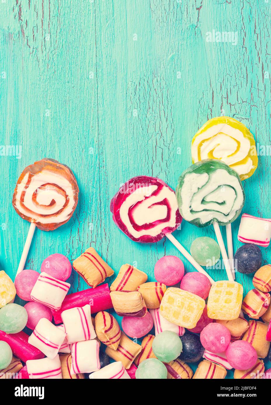 Pastel colored sweets isolated on white background Stock Photo - Alamy