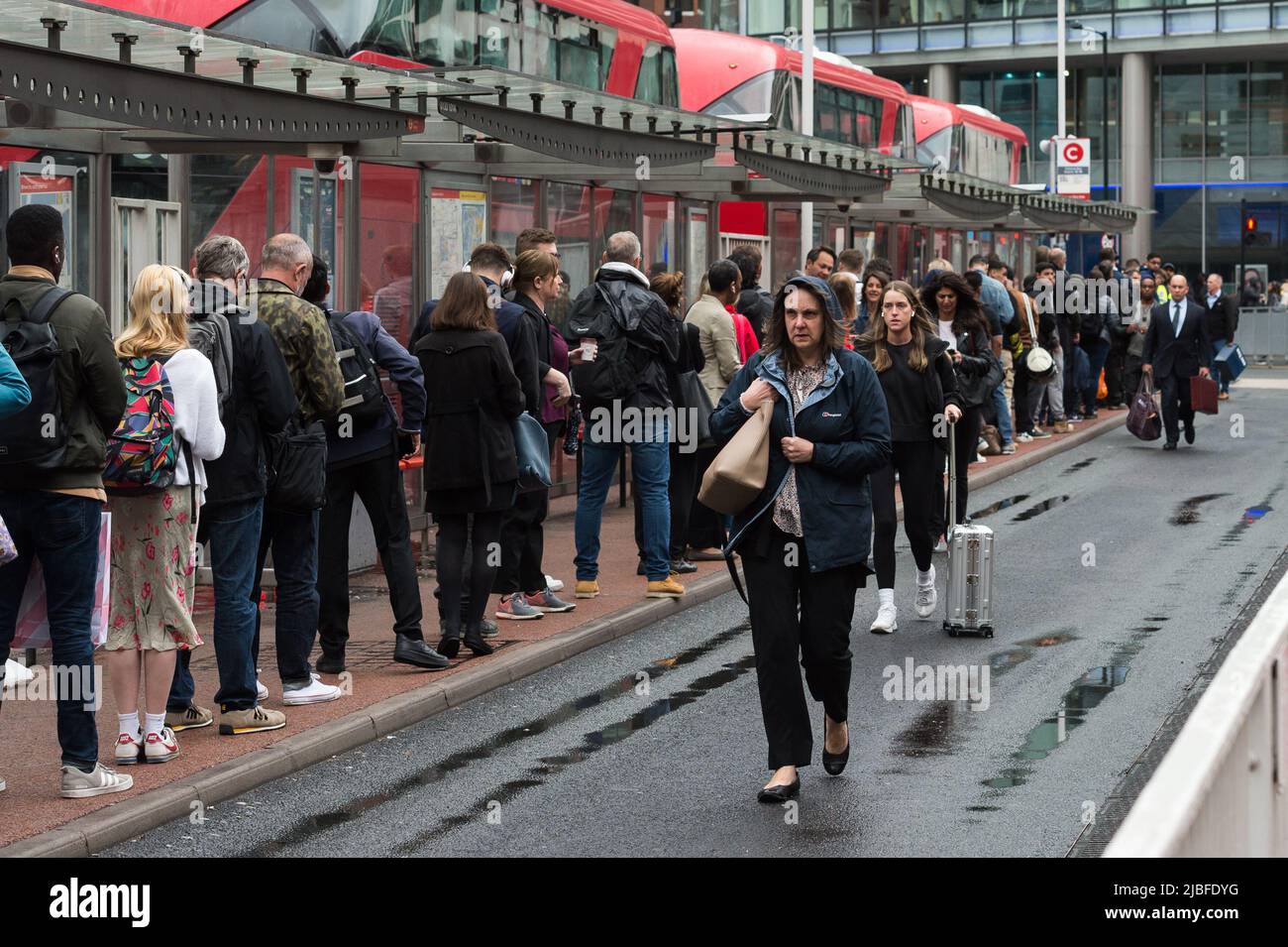 London, UK. 06th June, 2022. Commuters form large queues for buses ...