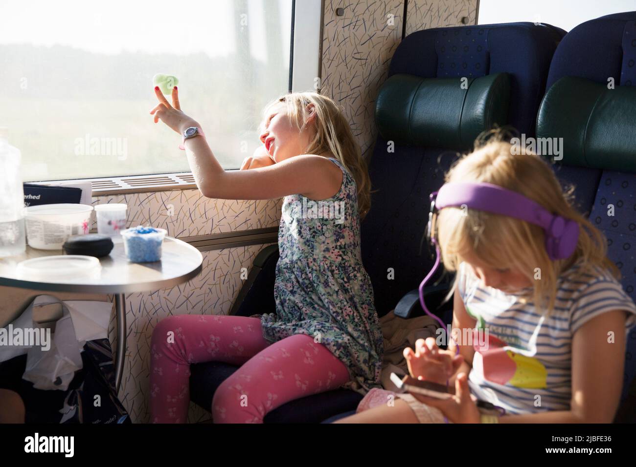 Family on train cell phone or mobile hi-res stock photography and ...
