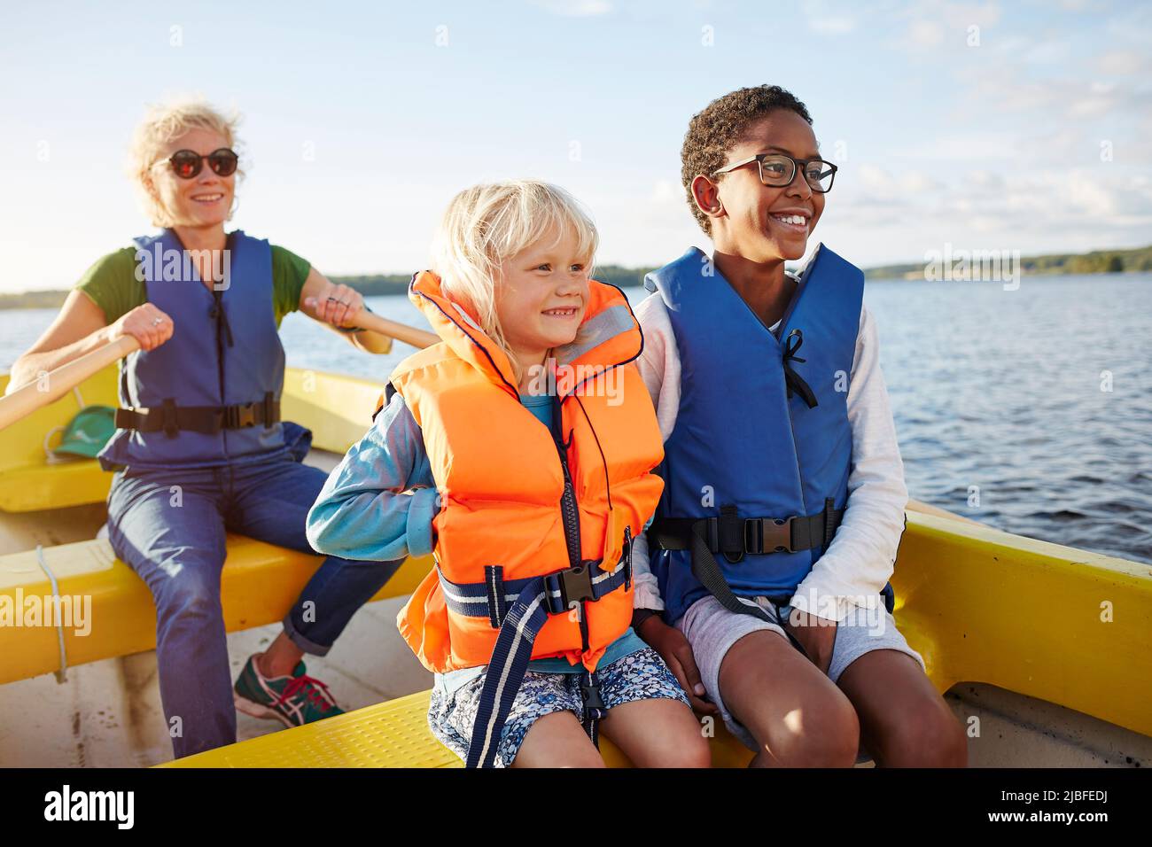 Three boys boat hi-res stock photography and images - Alamy