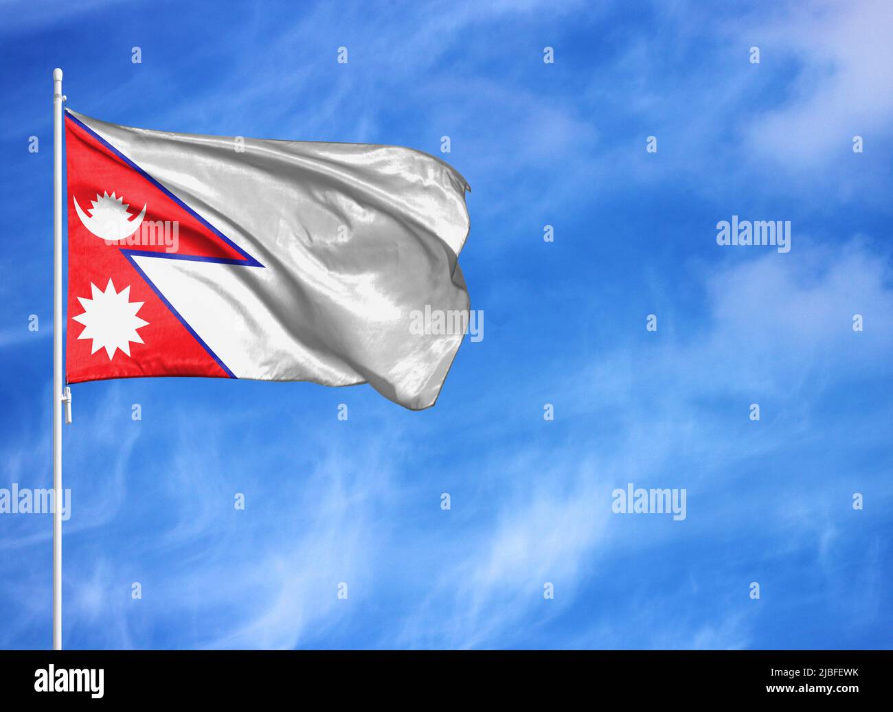 National flag of Nepal on a flagpole Stock Photo - Alamy
