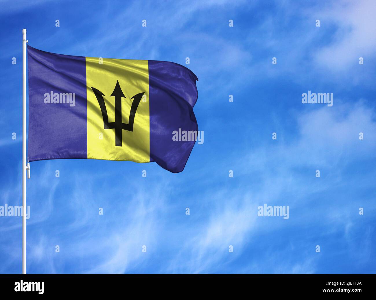 National flag of Barbados on a flagpole Stock Photo - Alamy