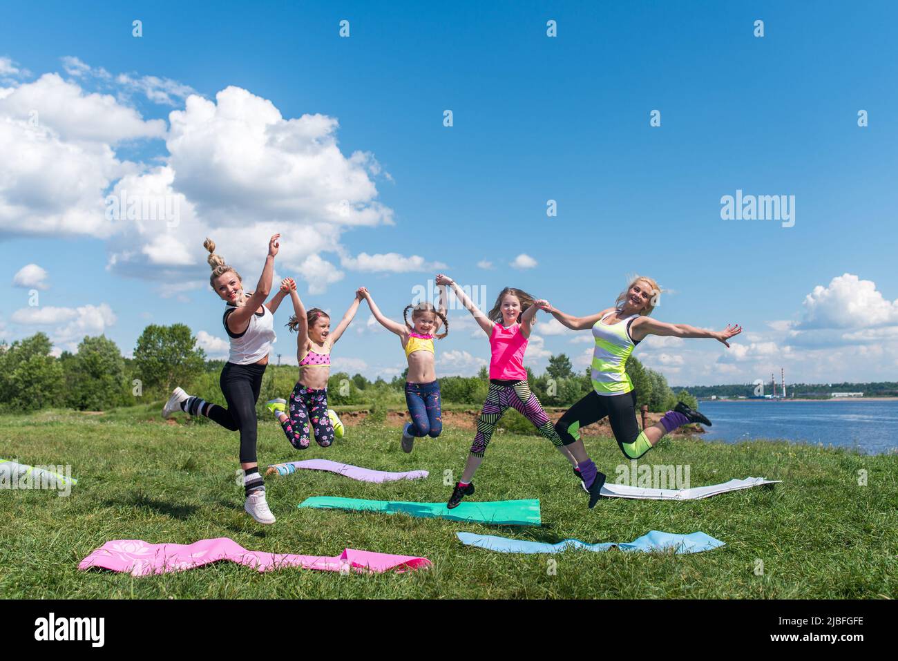 Fit woman jumping hi-res stock photography and images - Alamy
