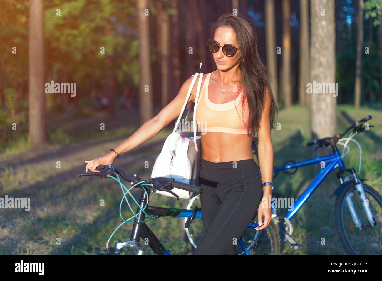 Portrait sporty woman bike hi-res stock photography and images - Alamy
