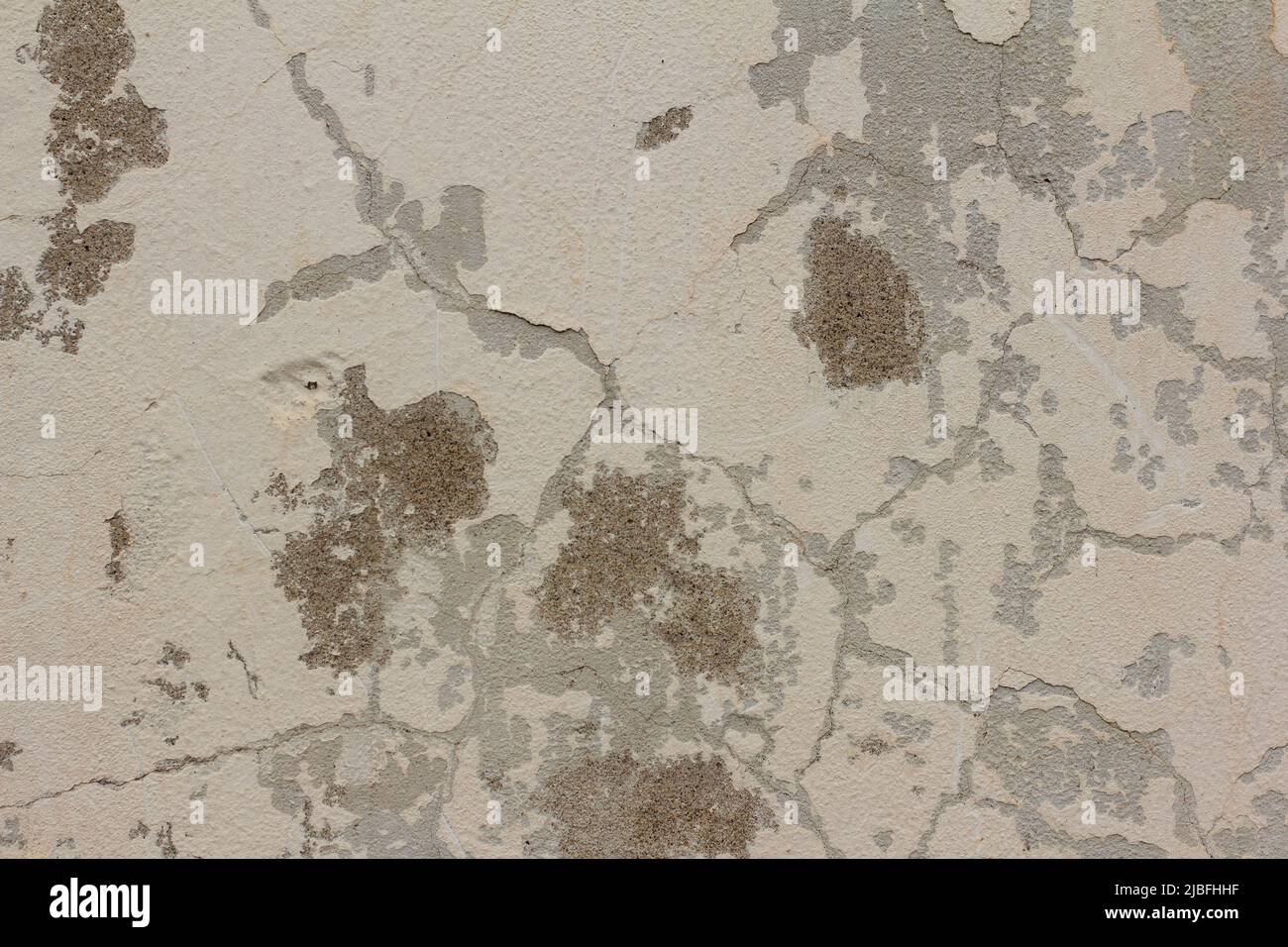 An old concrete wall.A fragment of a concrete wall with collapsed ...