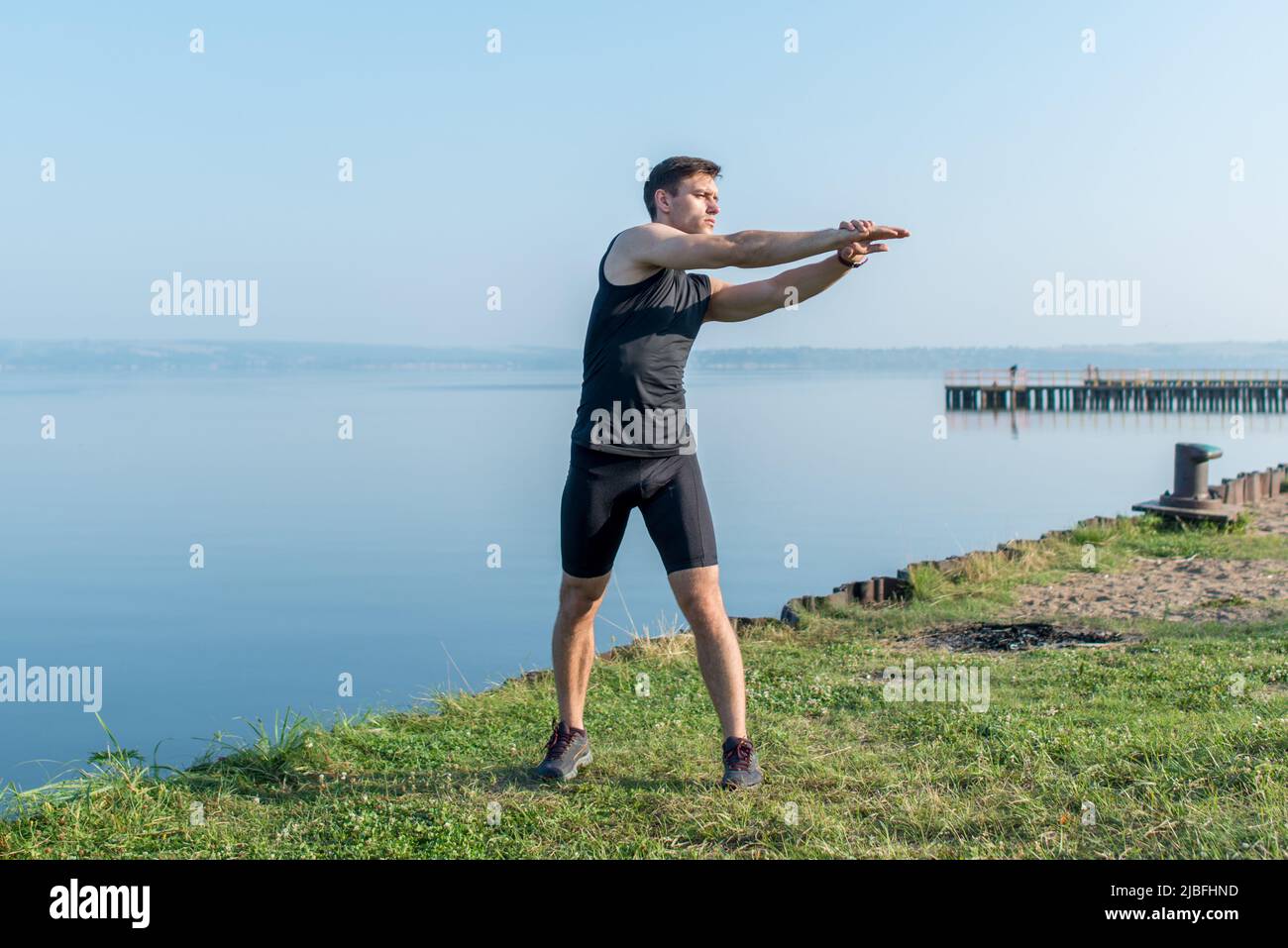Man stretching in the morning hi-res stock photography and images - Alamy