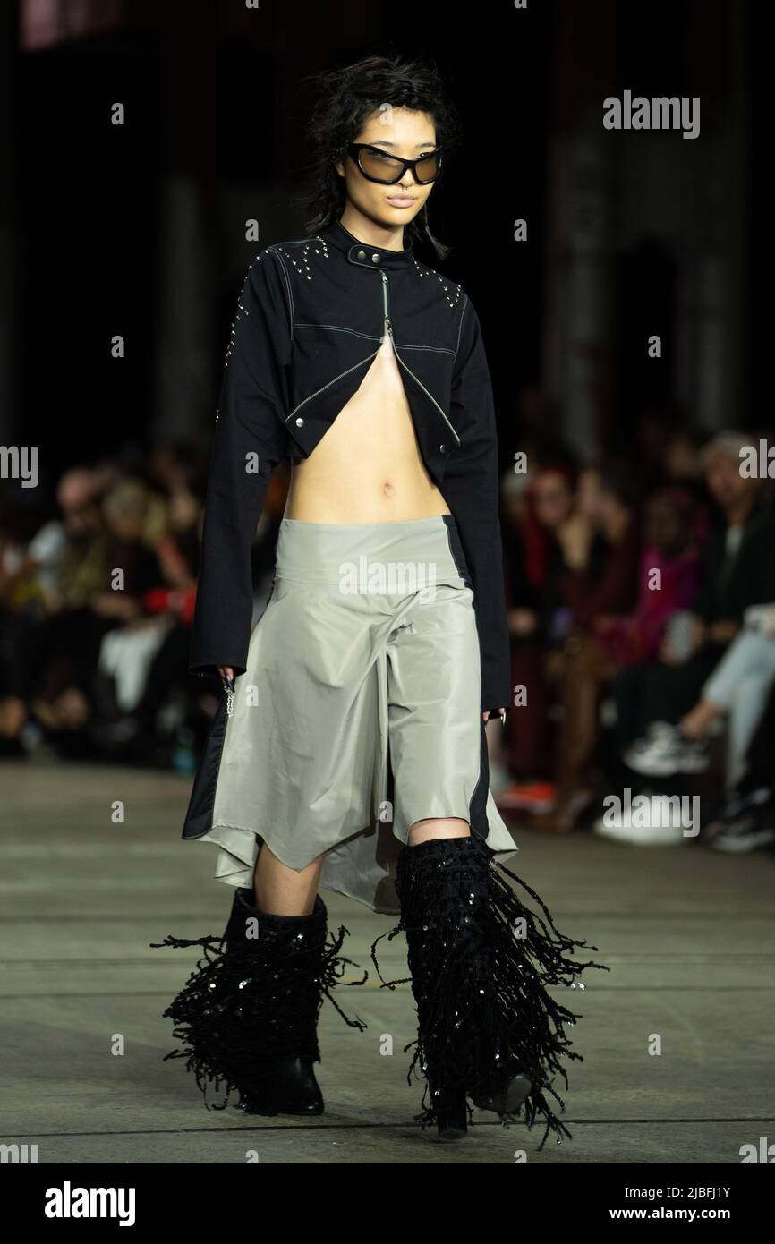 A model walks the runway in a design by PHOEBE PENDERGAST during the ...