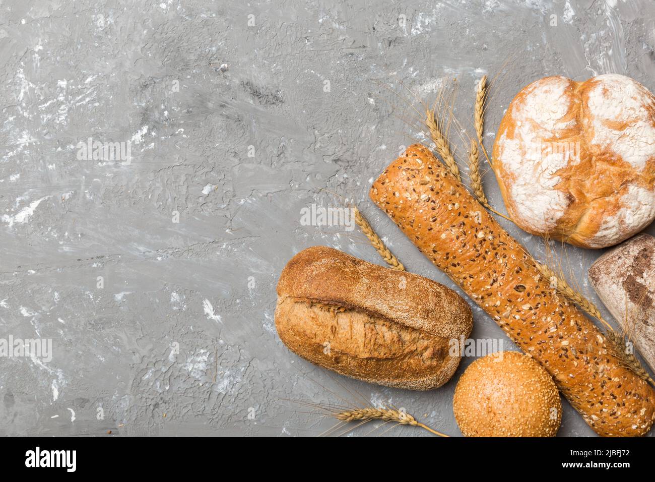 Homemade natural breads. Different kinds of fresh bread as background ...
