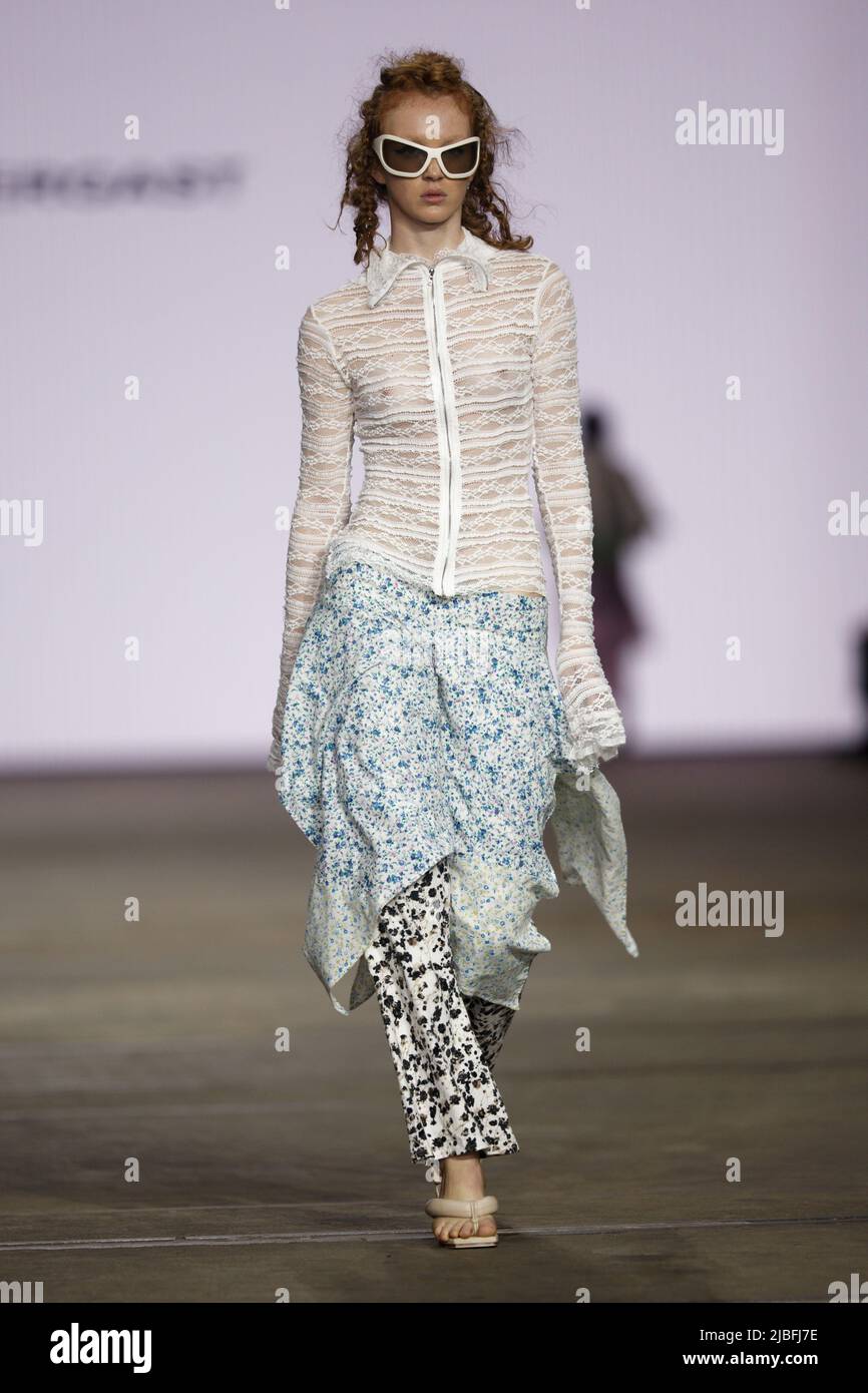 A model walks the runway in a design by PHOEBE PENDERGAST during the ...