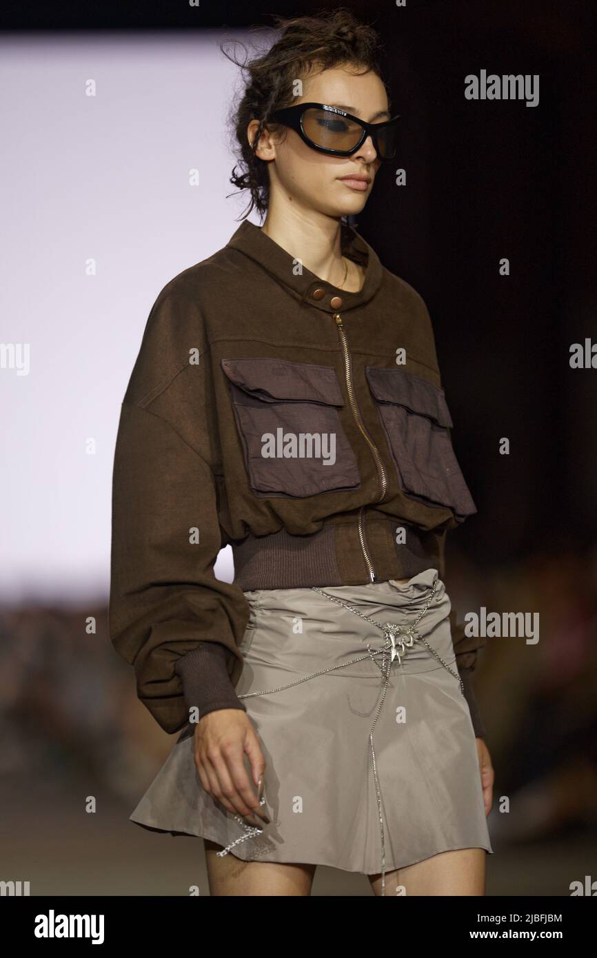 A model walks the runway in a design by PHOEBE PENDERGAST during the ...