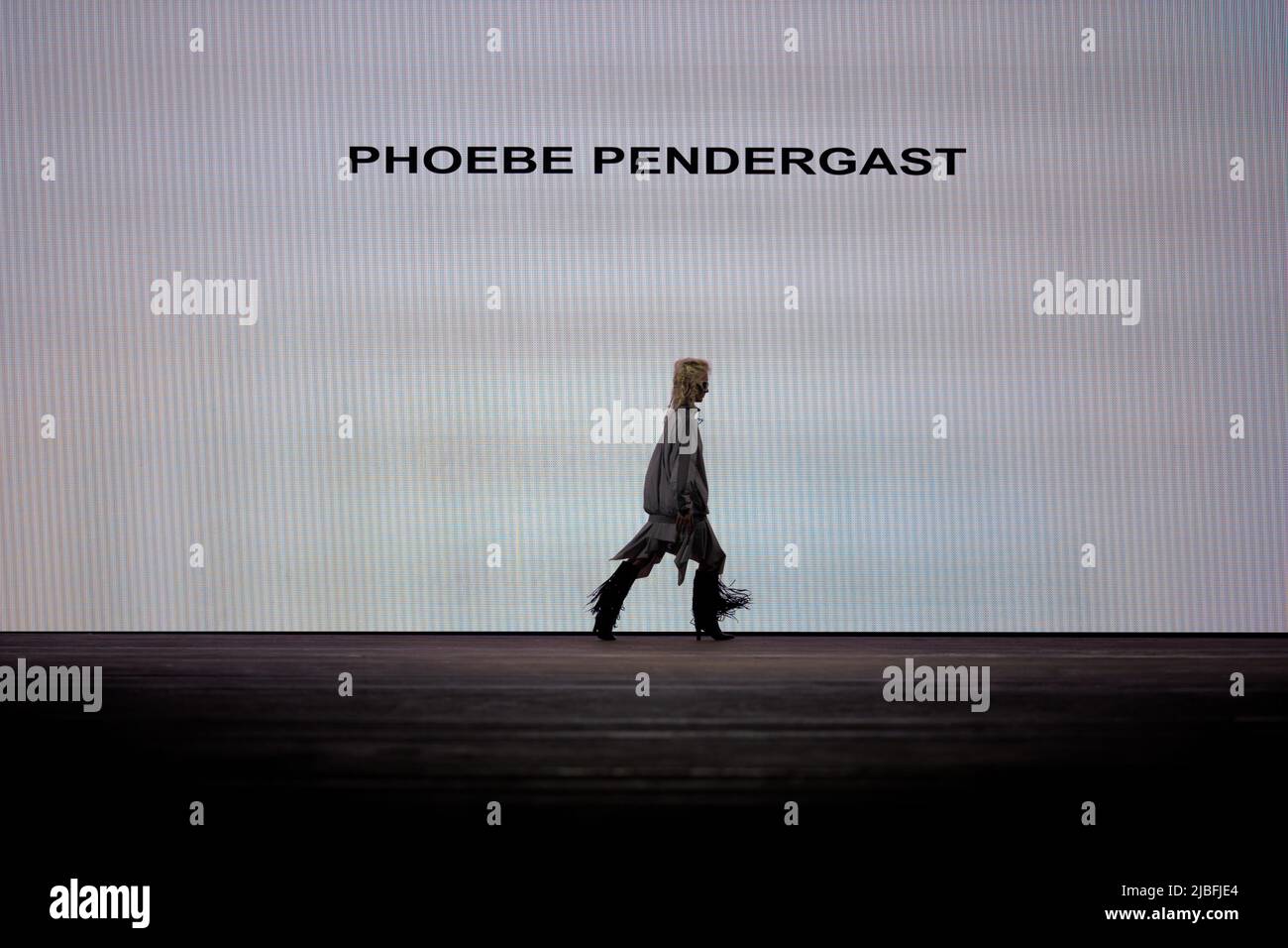 A model walks the runway in a design by PHOEBE PENDERGAST during the ...