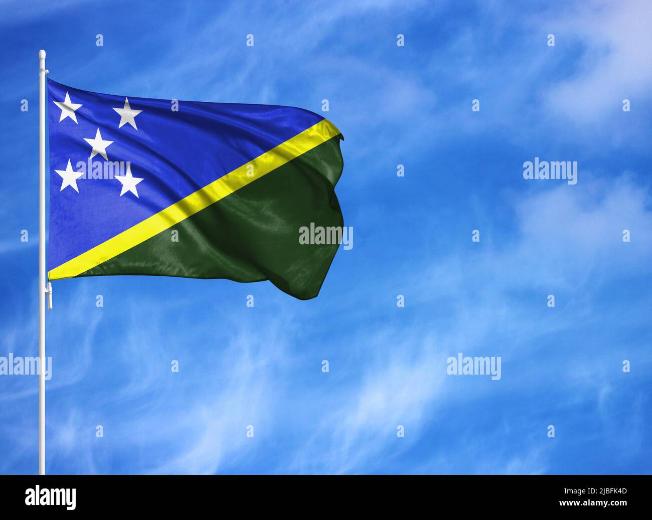 National flag of Solomon Islands on a flagpole Stock Photo - Alamy