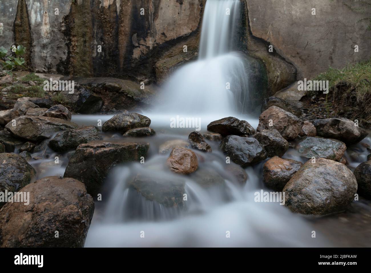 Water flowing through stone channels in Wadi Tanuf near Nizwa, Oman ...