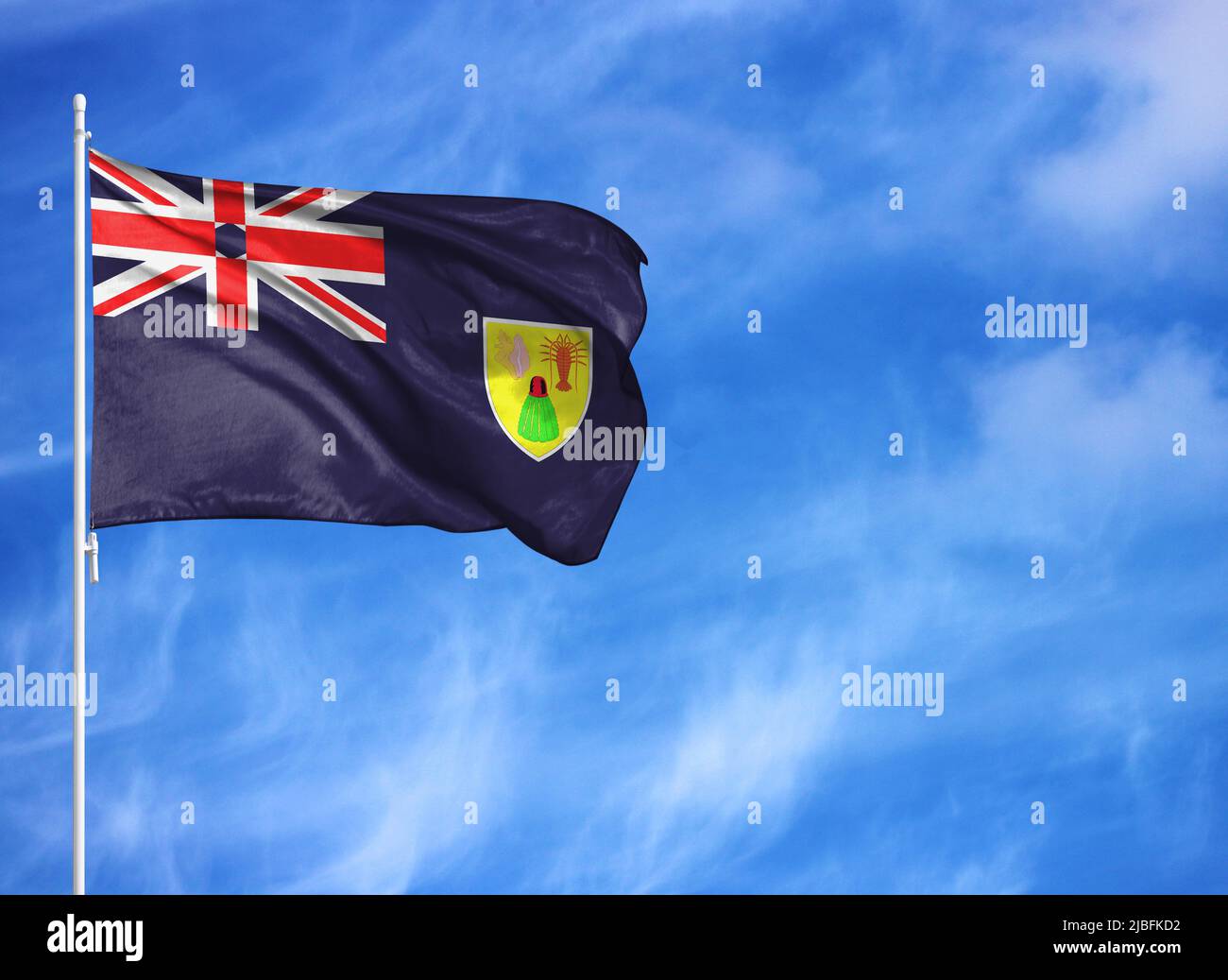 National flag of Turks and Caicos Islands on a flagpole Stock Photo - Alamy