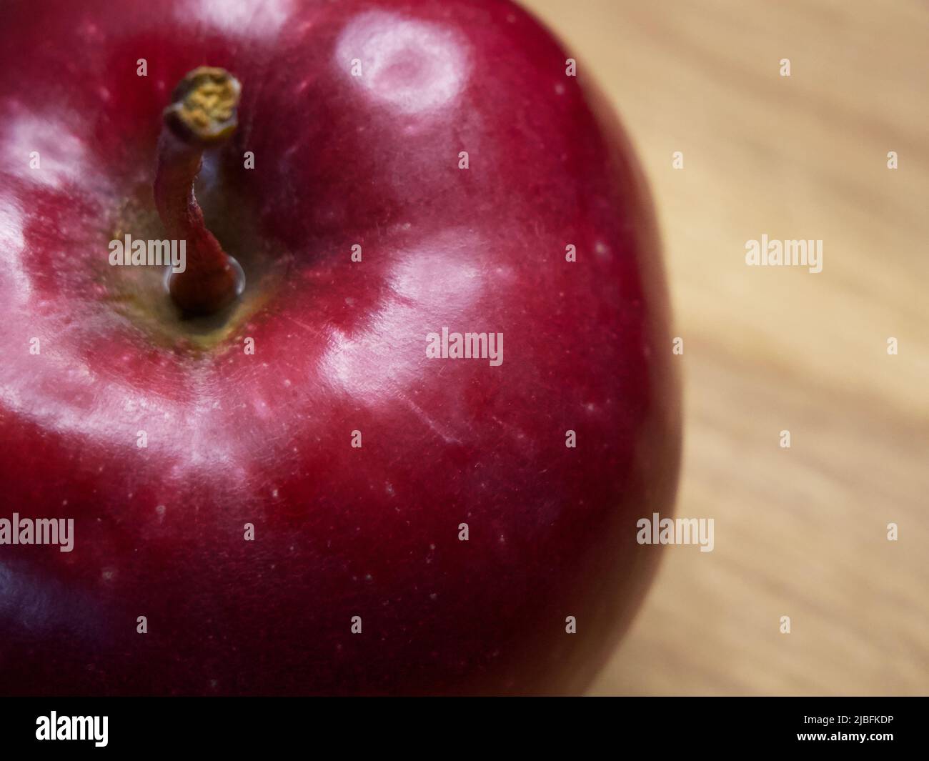 One big red apple. A macro shot of an apple of the Red Chief variety ...