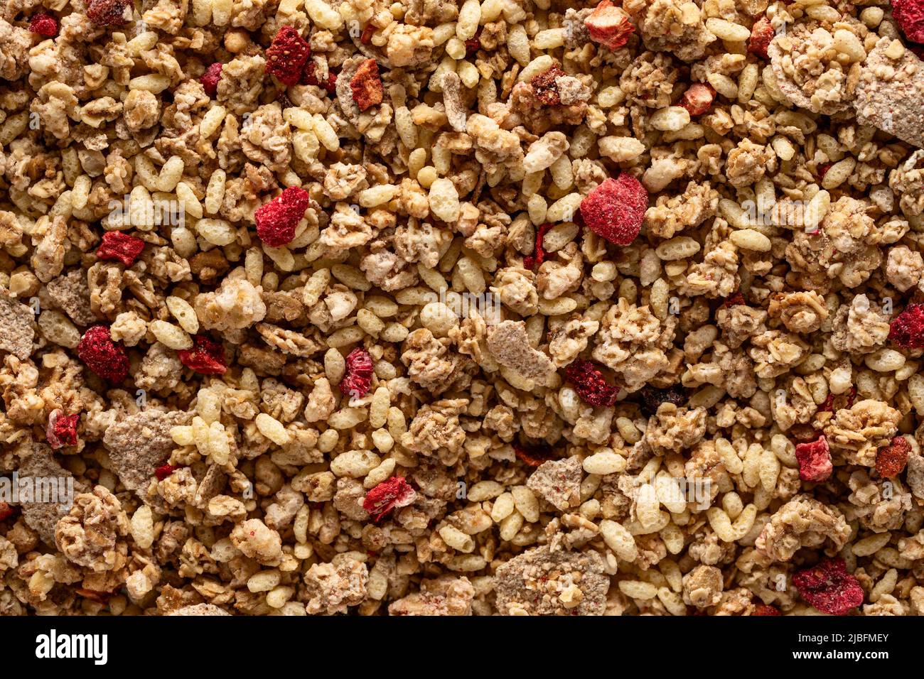 Close-up view from above of muesli with dried raspberries Stock Photo ...