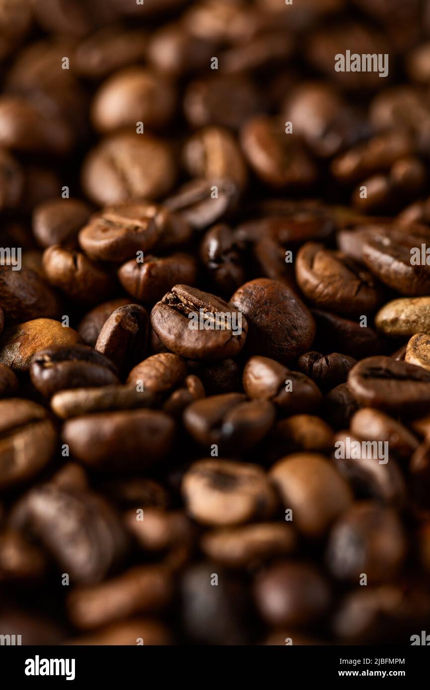 Overhead view of backdrop representing halves of dark brown coffee ...
