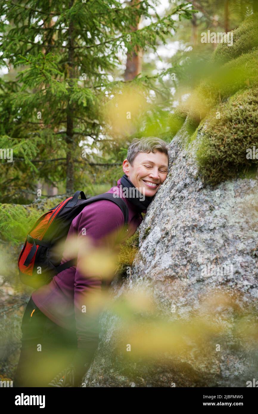 Leaning at rock hi-res stock photography and images - Alamy