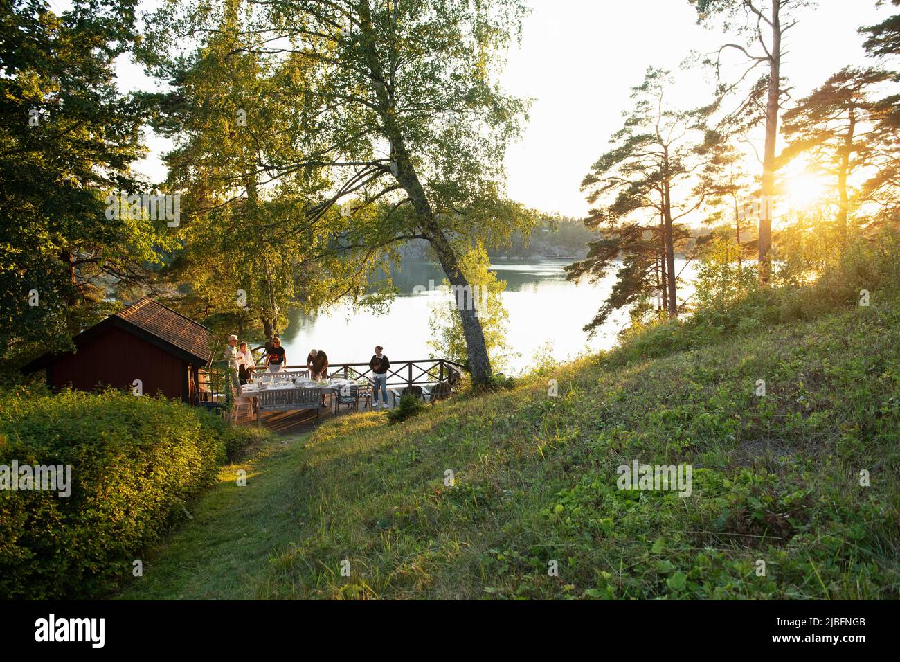 Young women standing on balcony hi-res stock photography and images - Alamy