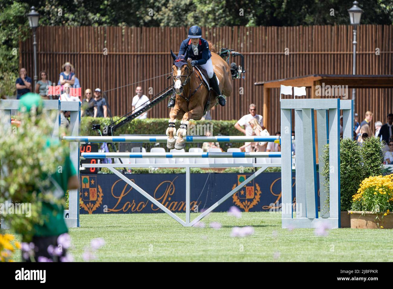Rome, Italy,May 28, 2022 - A rider jumps over an obstacle riding a ...
