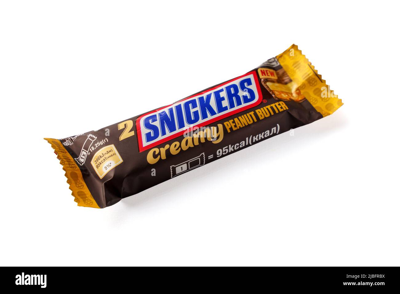 Chocolate bar Snickers on a white background, soft focus Stock Photo ...