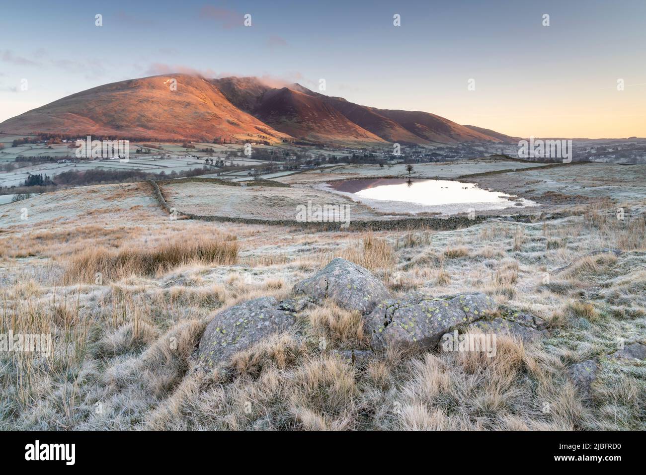 Sunrise. Tewet Tarn, Keswick, Lake District, Cumbria, UK. 7 March 2022 ...