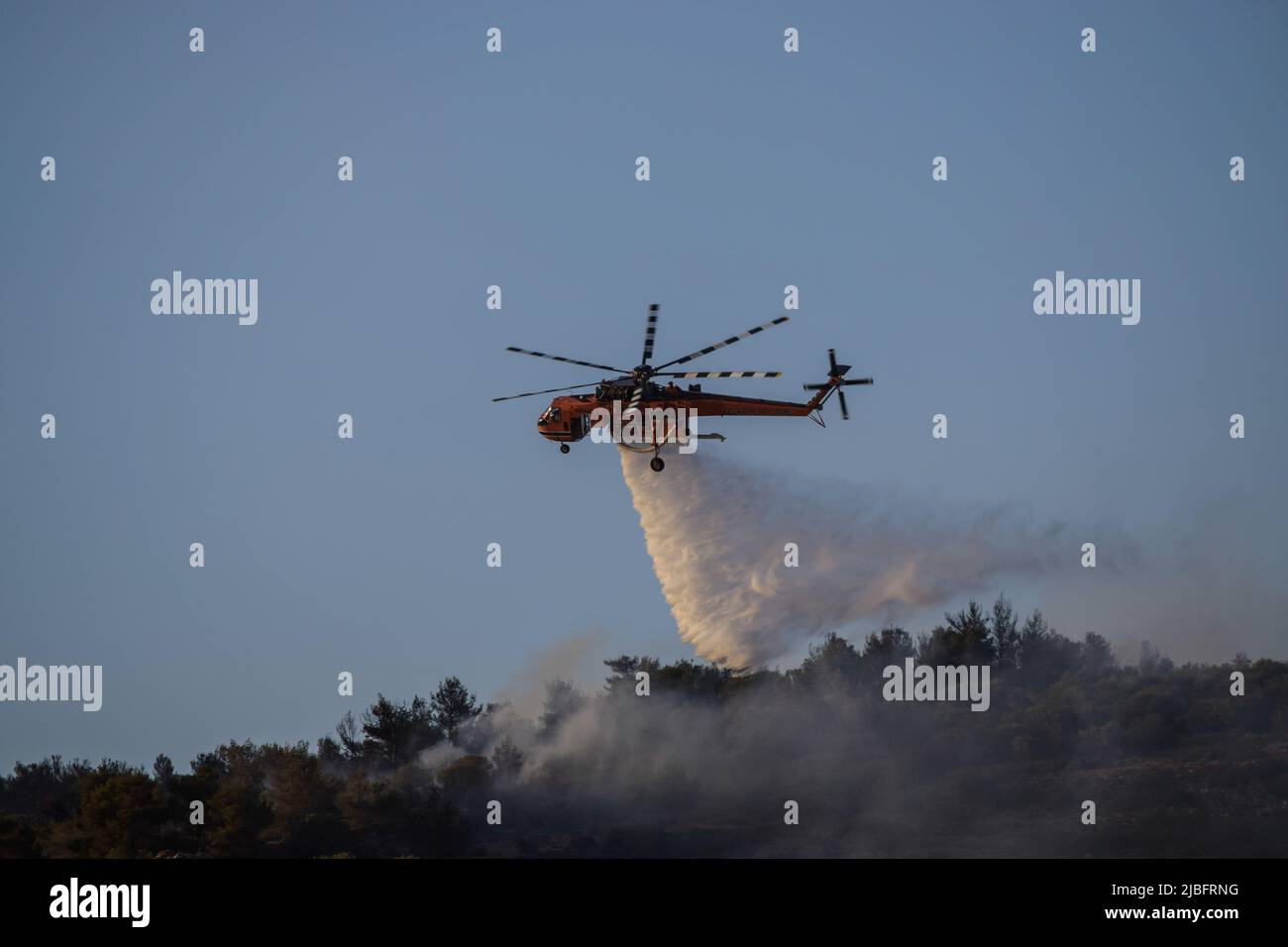 A firefighting Erickson Air Crane helicopter operates in the region of ...