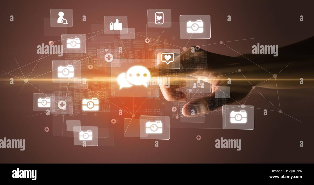 Hand pressing social media multimedia application screen with media ...