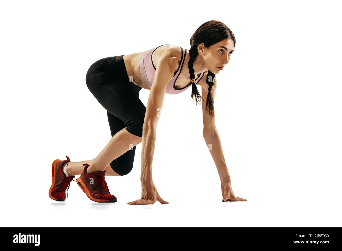 Young caucasian woman running isolated on white studio background. One ...