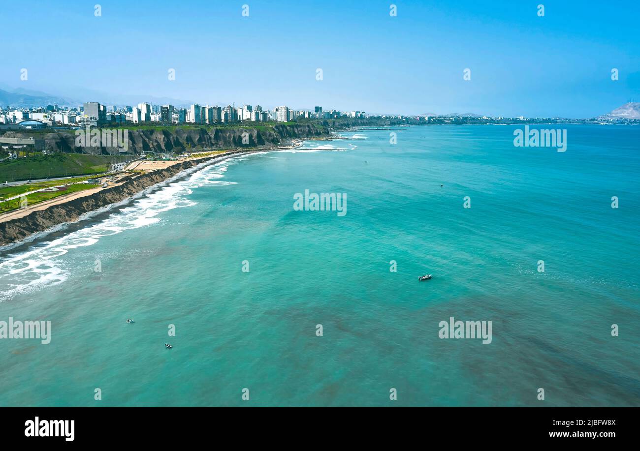 Scenic view of traditional fishing boats in the bay of Lima, Peru. Self ...