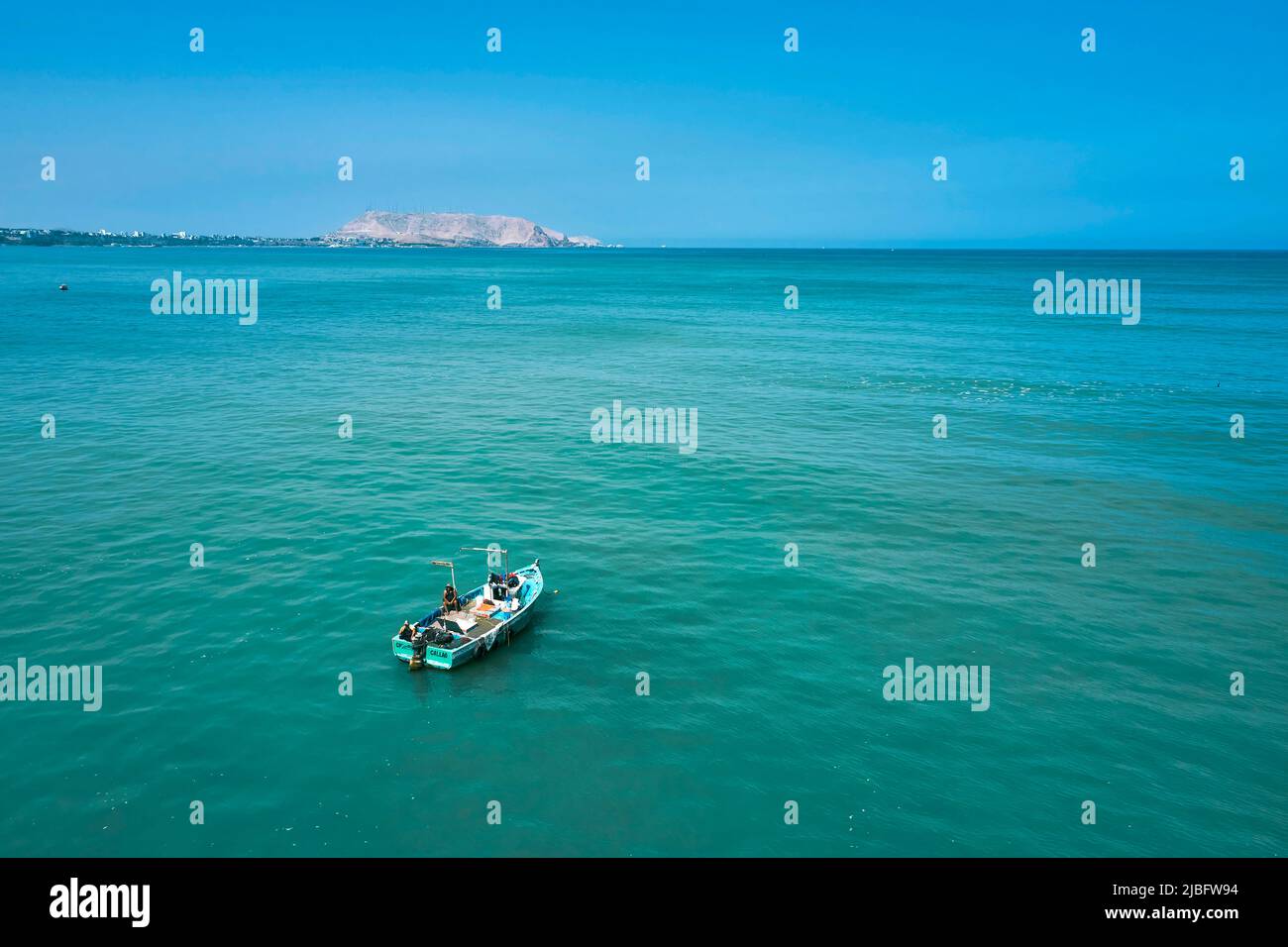 Scenic view of traditional fishing boats in the bay of Lima, Peru. Self ...