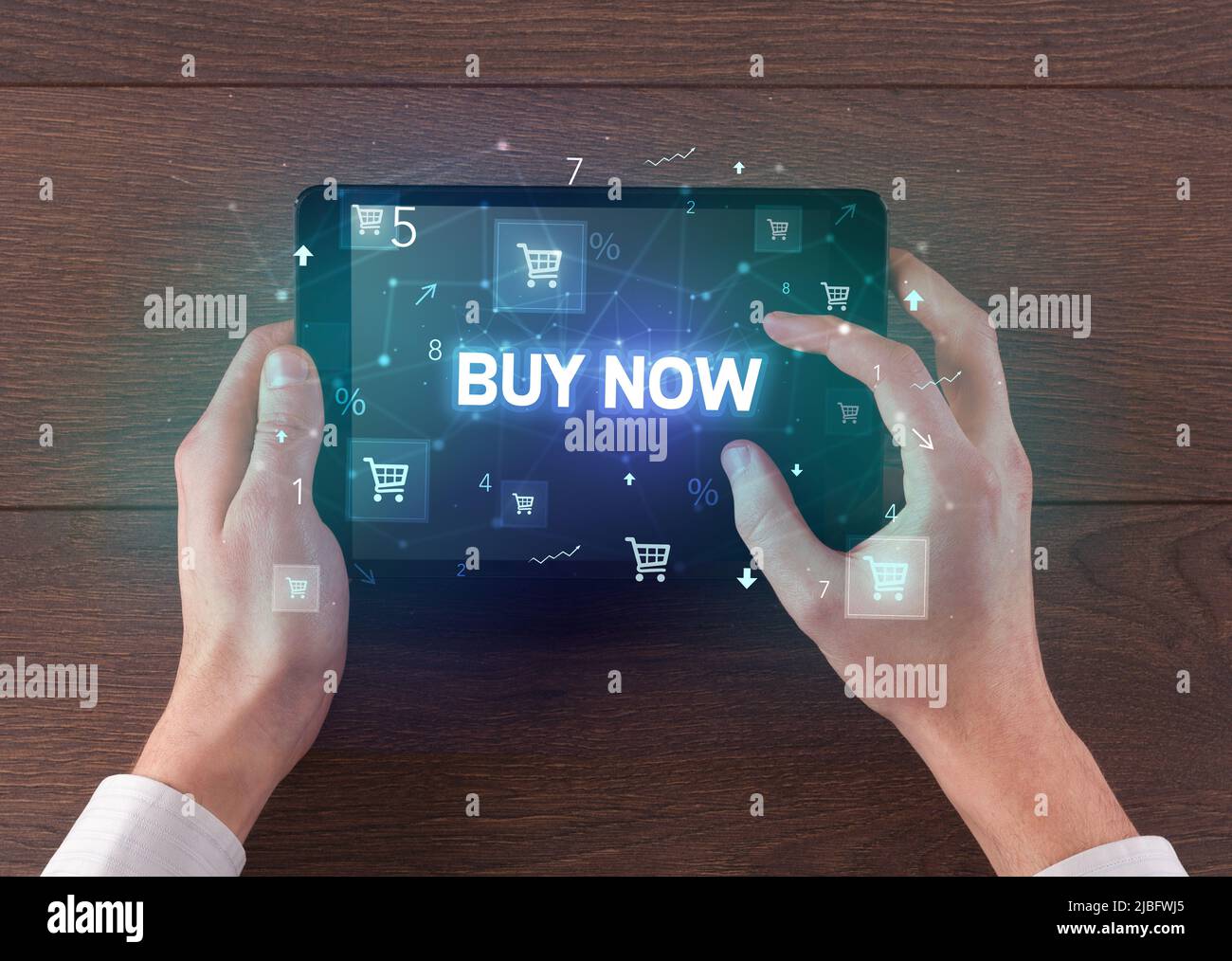 Close-up of a hand holding tablet with shopping inscription Stock Photo ...