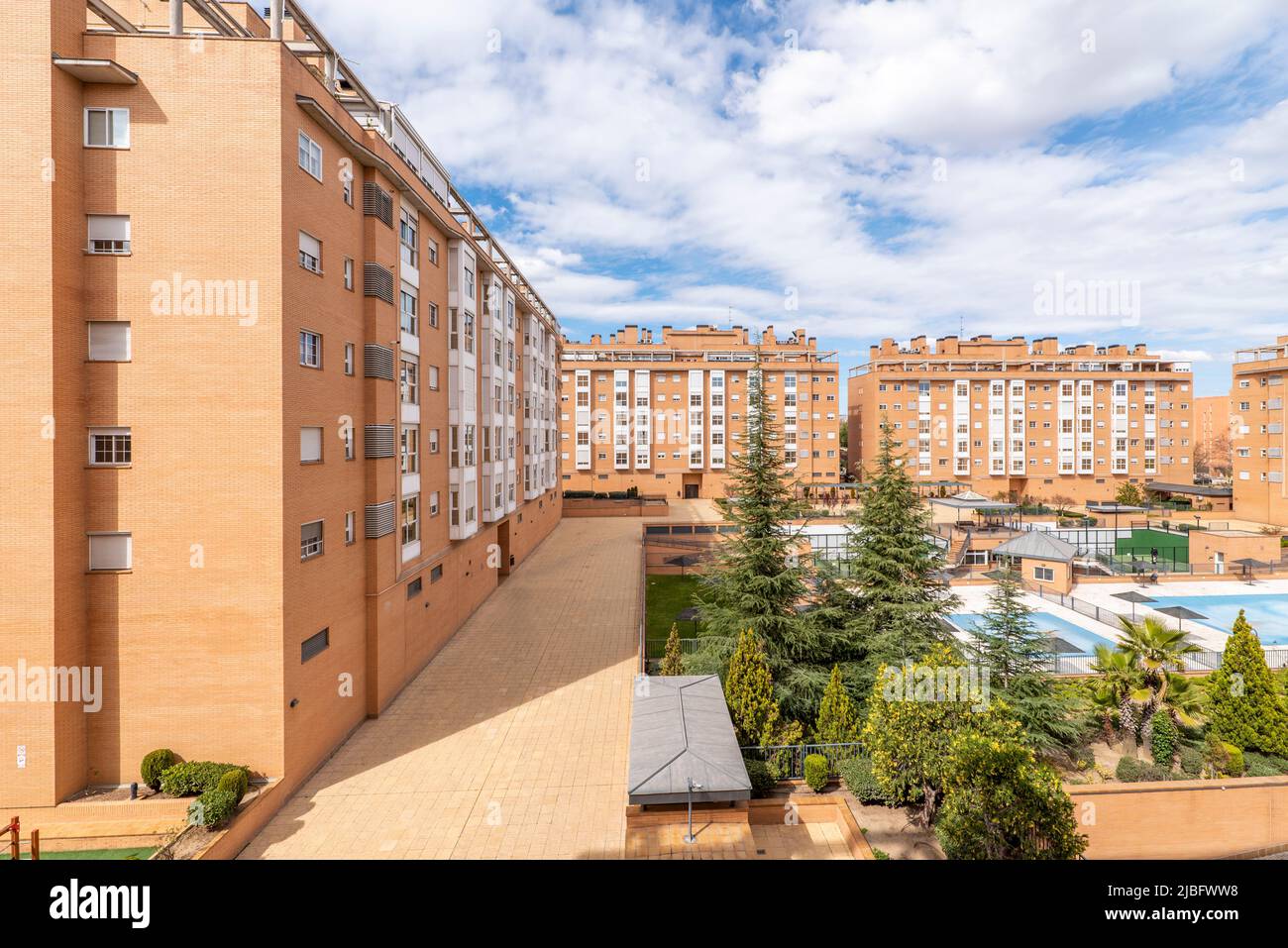 Facades of residential apartment buildings with common areas with ...