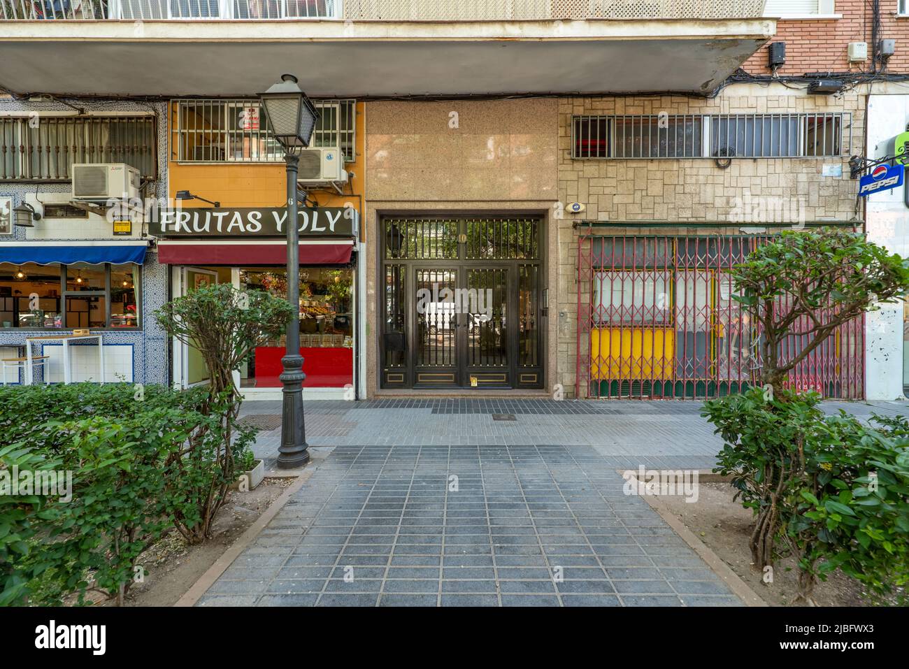Facade of an urban residential house at street level Stock Photo - Alamy