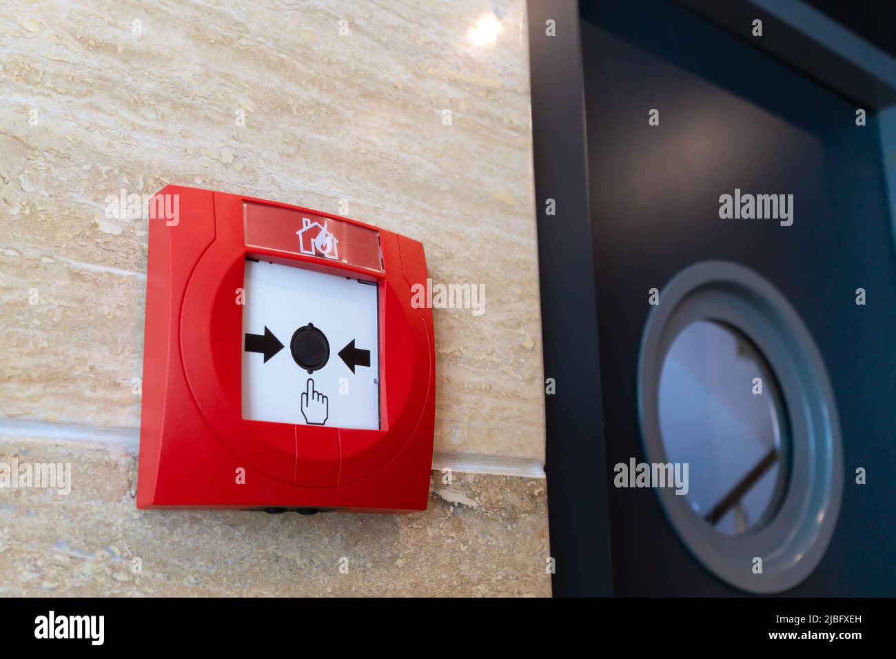 Close-up of the fire alarm switch on the wall in the corridor Stock ...