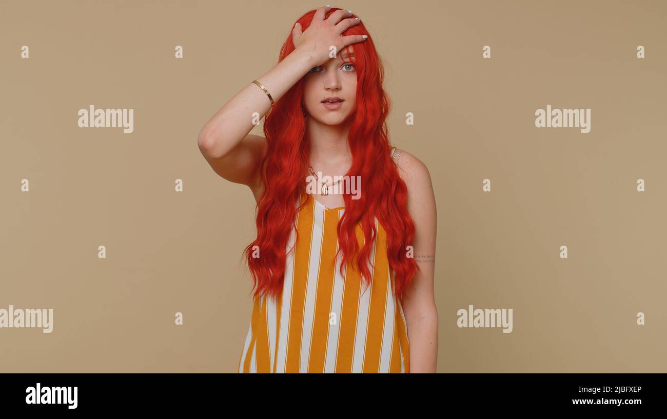 Upset tired, bored ginger woman making face palm gesture, feeling bored ...