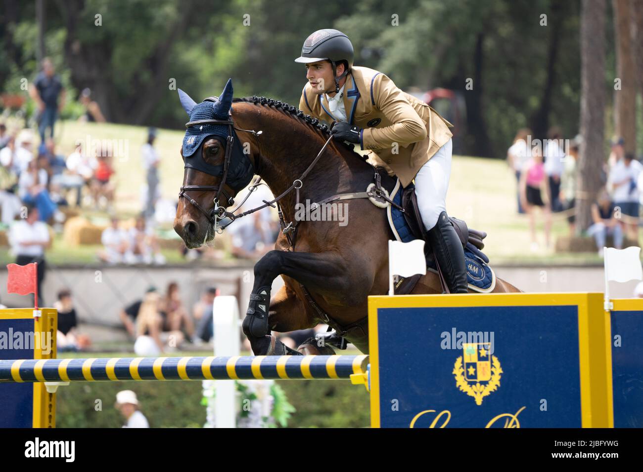 Rome, Italy,May 28, 2022 - A rider jumps over an obstacle riding a ...