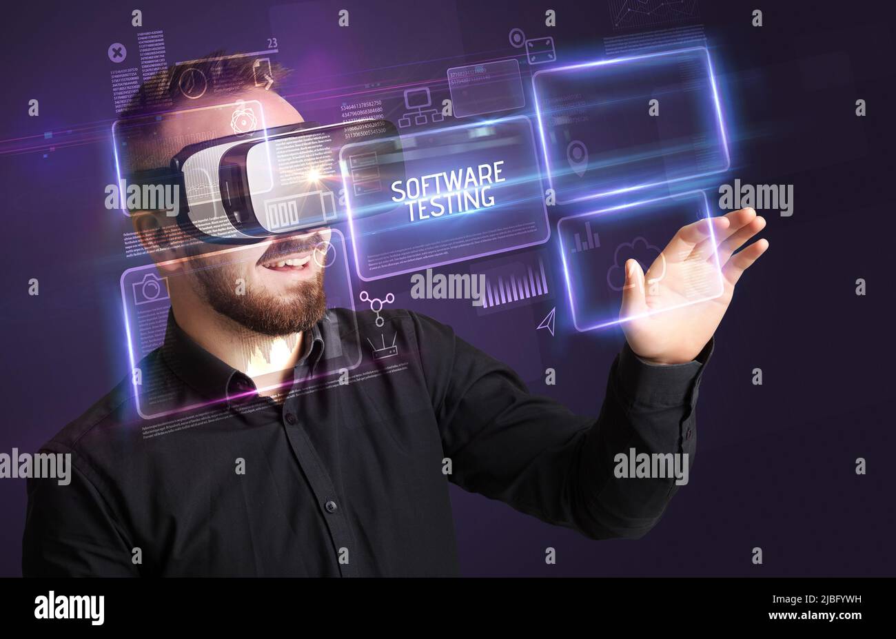 Businessman looking through Virtual Reality glasses, tech concept Stock ...
