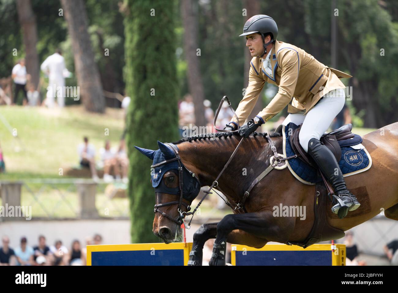 Rome, Italy,May 28, 2022 - A rider jumps over an obstacle riding a ...