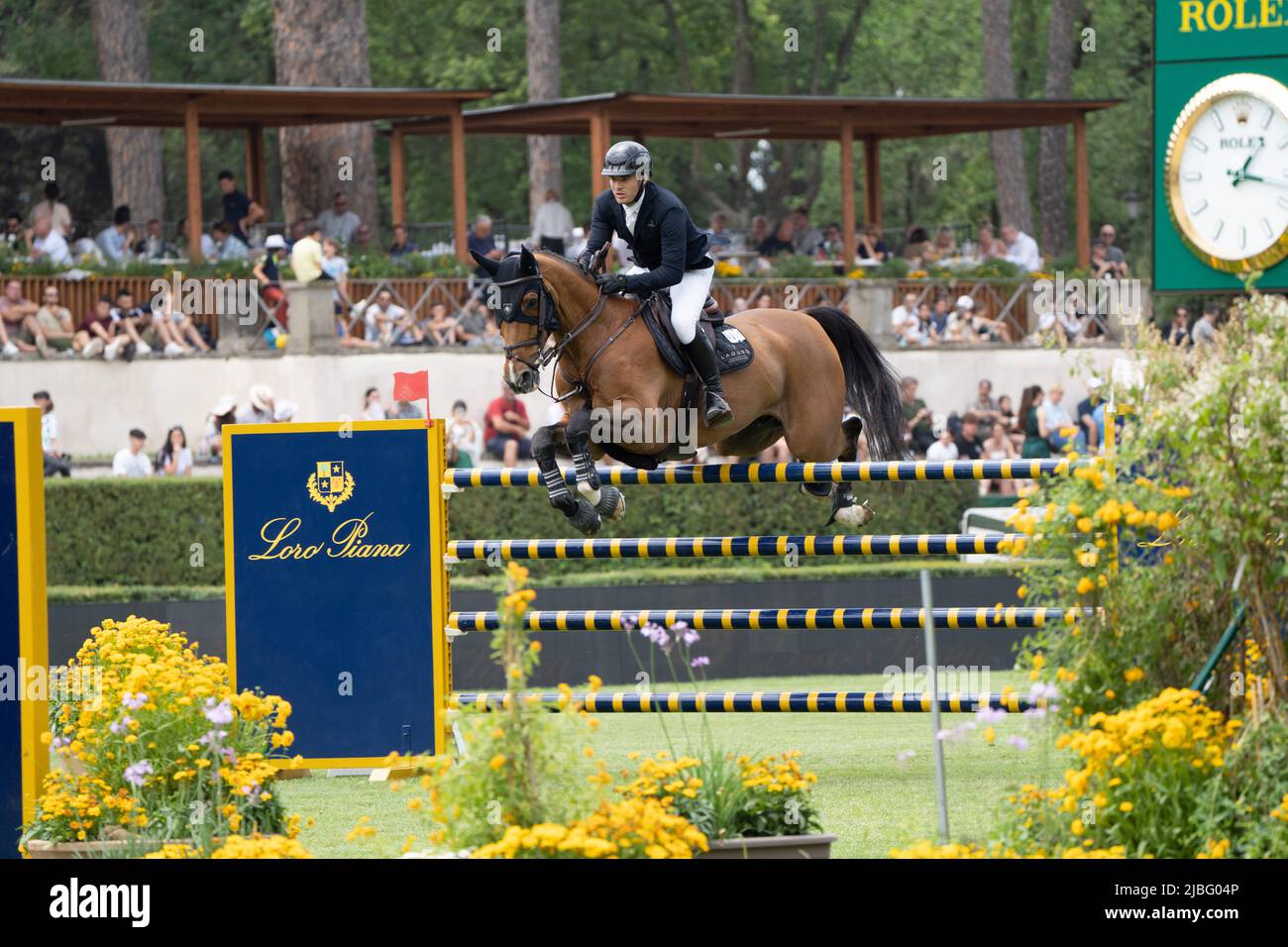 Rome, Italy,May 28, 2022 - A rider jumps over an obstacle riding a ...