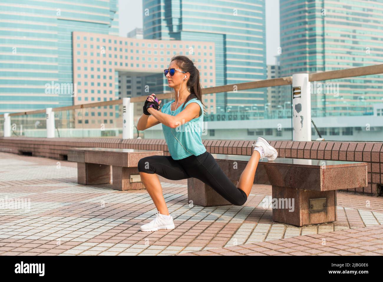 Woman sidewalk lunge exercise hi-res stock photography and images - Alamy